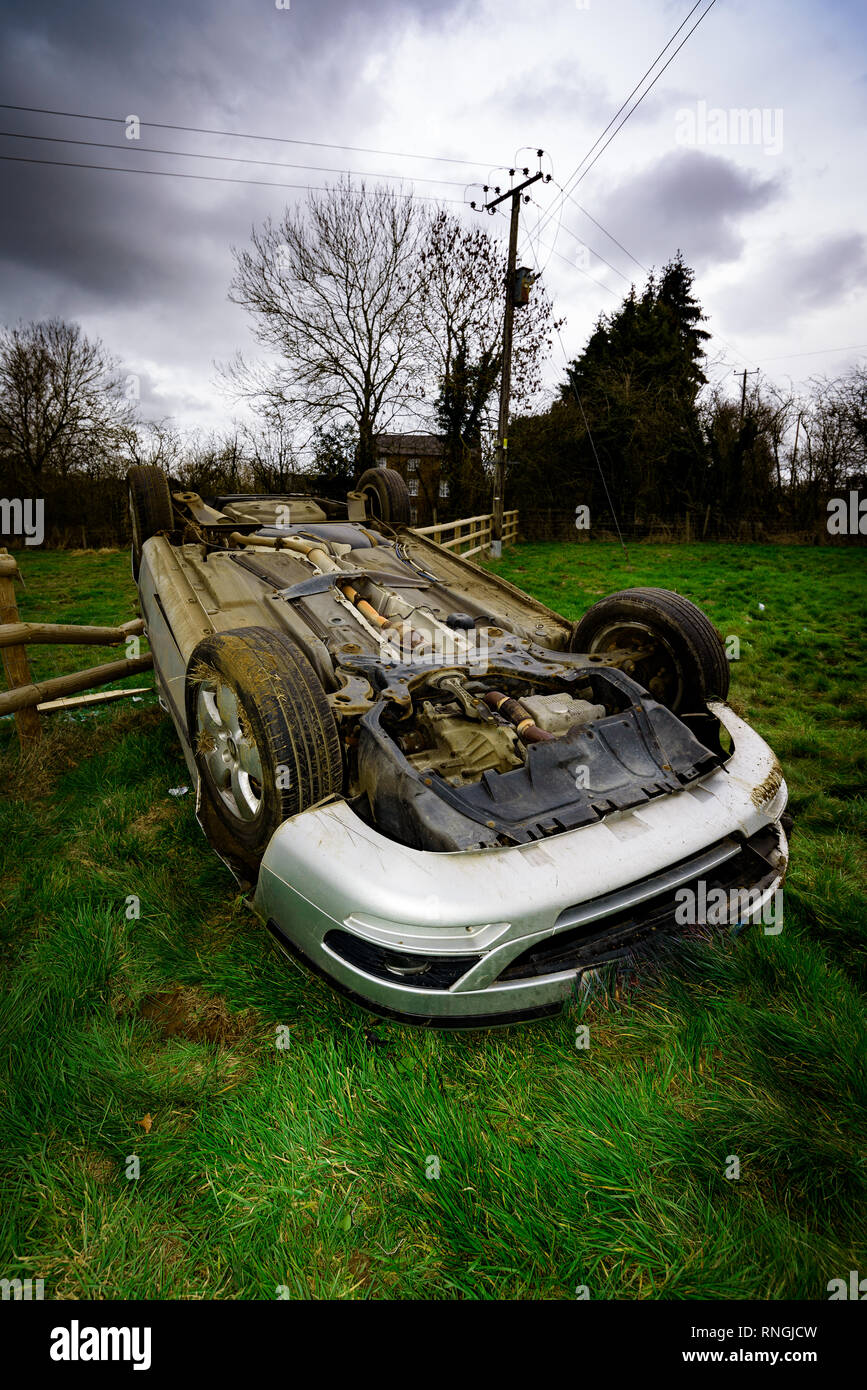 Car Crash and Car Damage. Vehicle in a field after high speed crash ...