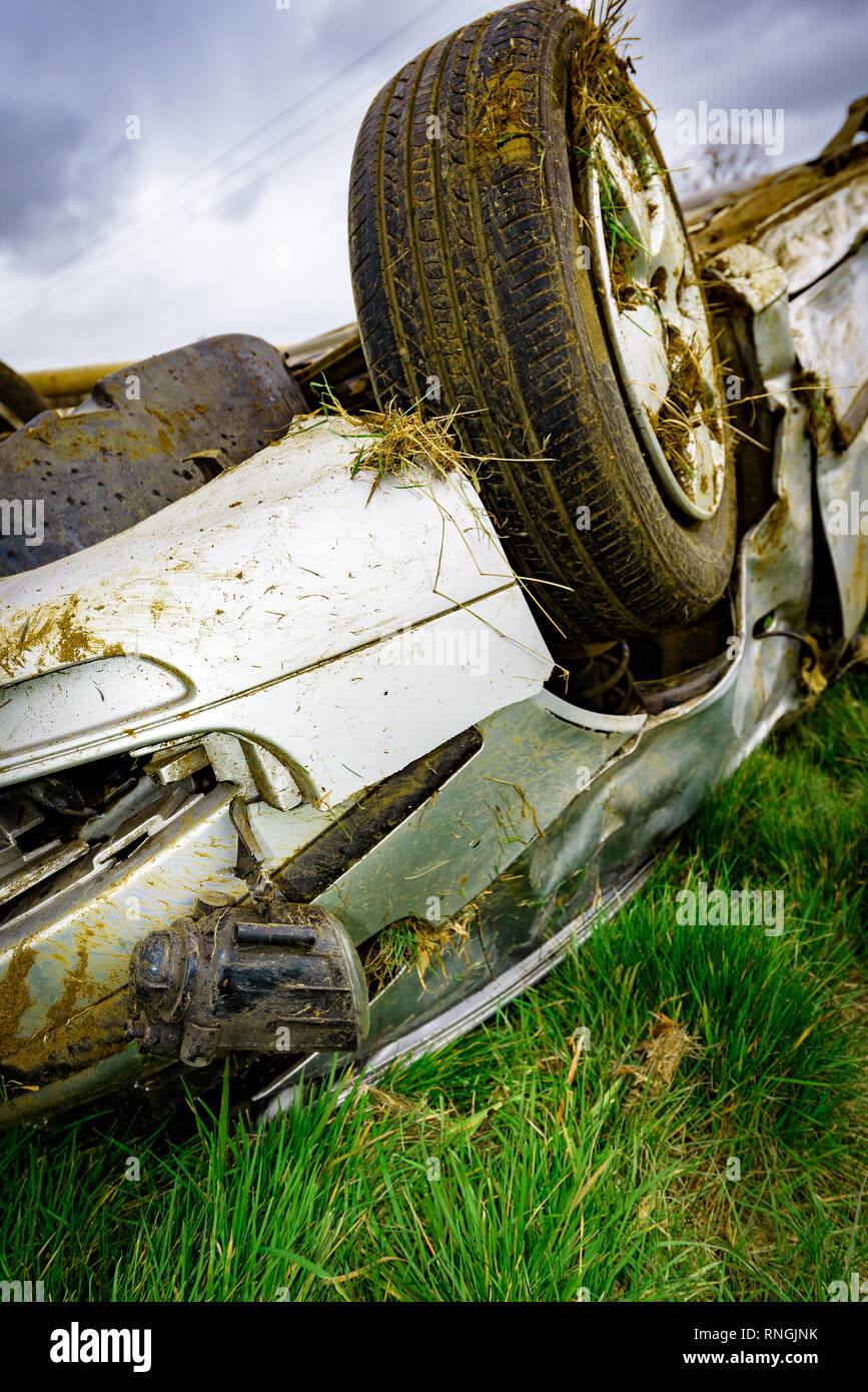Car Crash and Car Damage. Vehicle rolled over in a field after a high ...