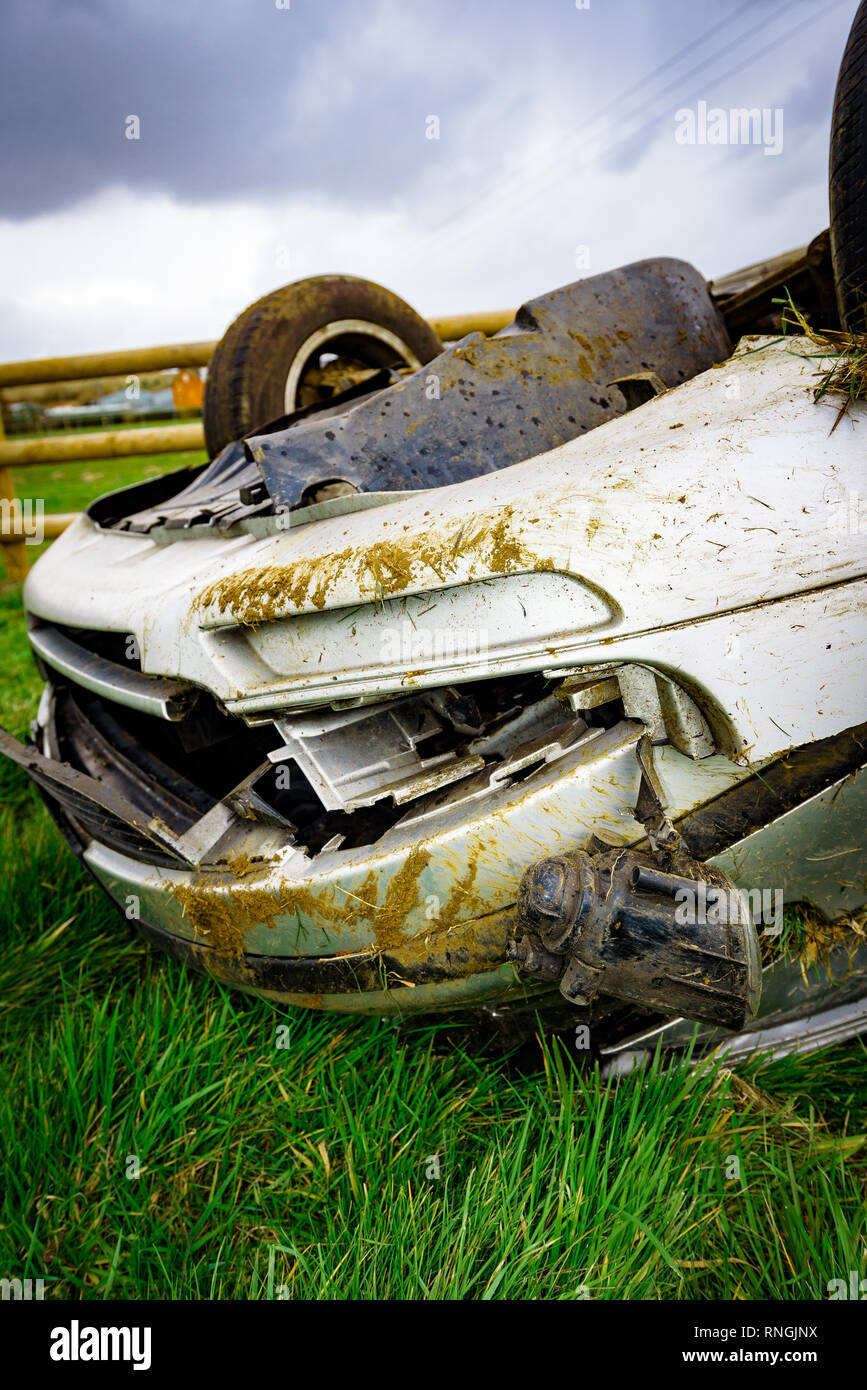 Car Crash and Car Damage. Vehicle rolled over in a field after a high ...