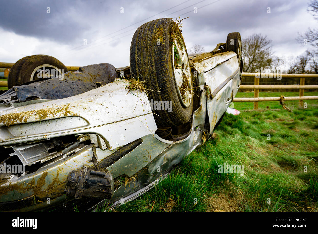 Car Crash and Car Damage. Vehicle rolled over in a field after a high ...