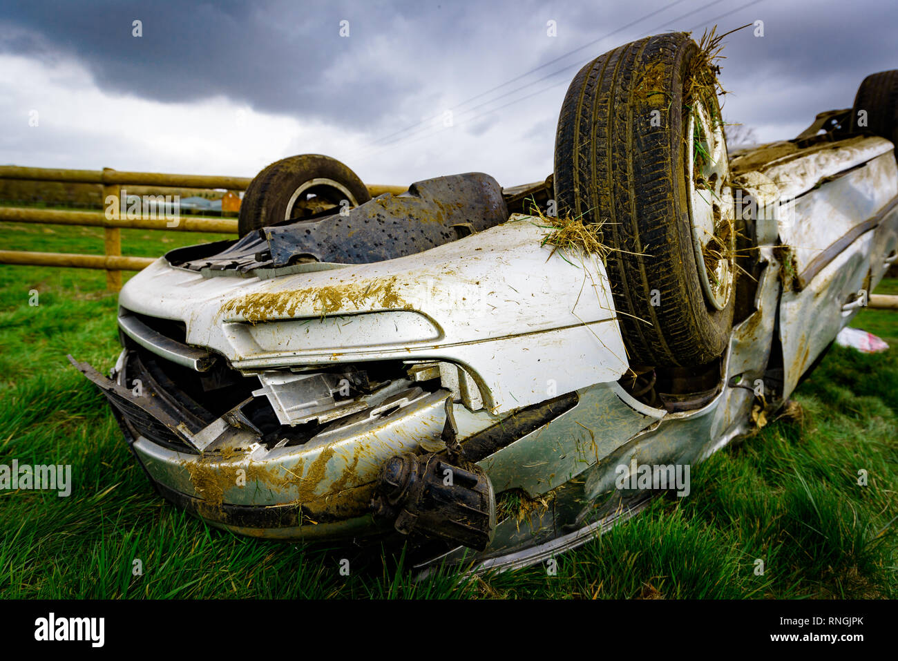 Car Crash and Car Damage. Vehicle rolled over in a field after a high ...