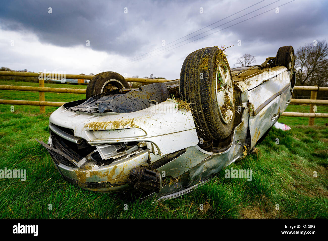 Car Crash and Car Damage. Vehicle rolled over in a field after a high ...