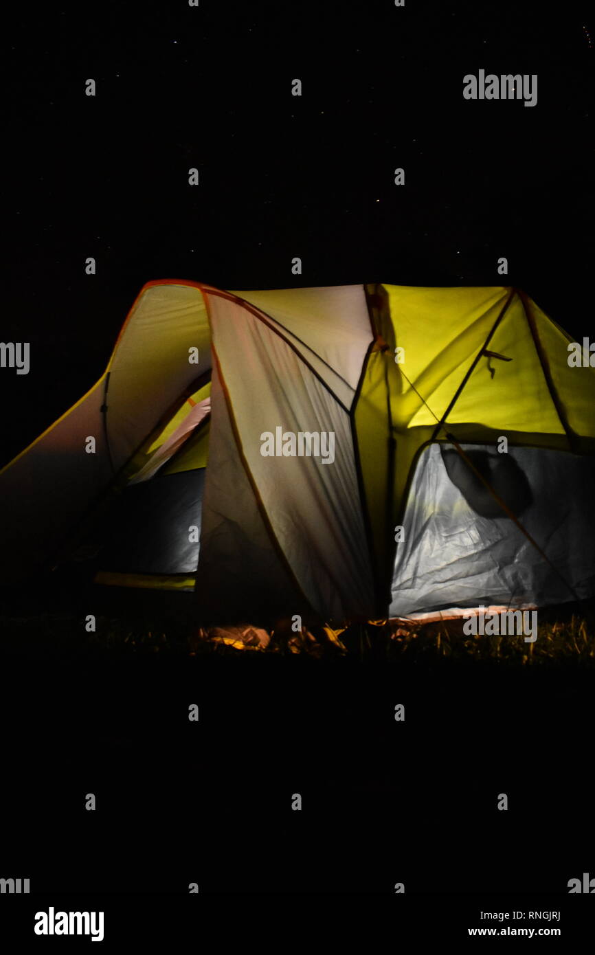 Illuminated green tent night hi-res stock photography and images - Alamy