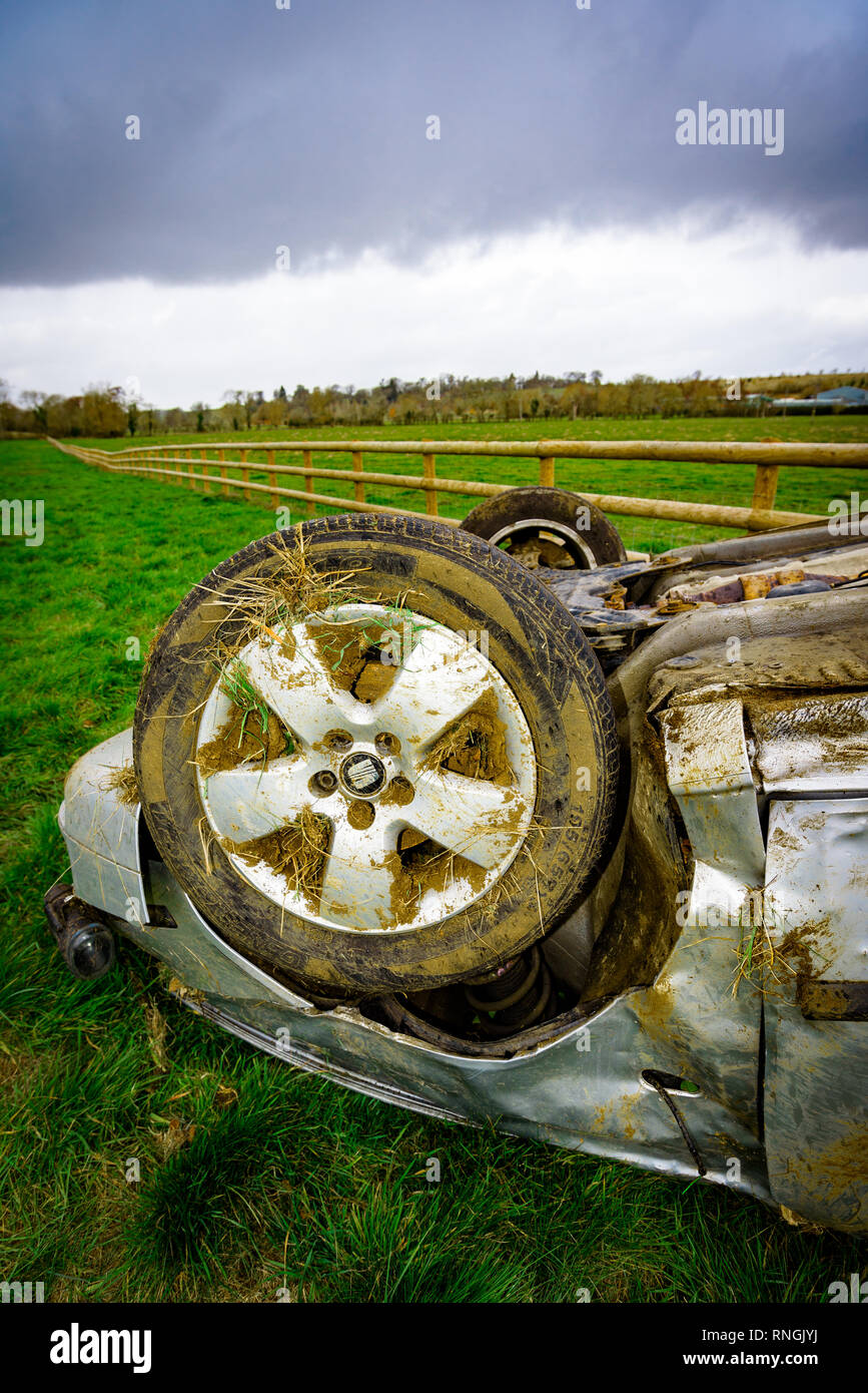Car Crash and Car Damage. Vehicle rolled over in a field after a high ...