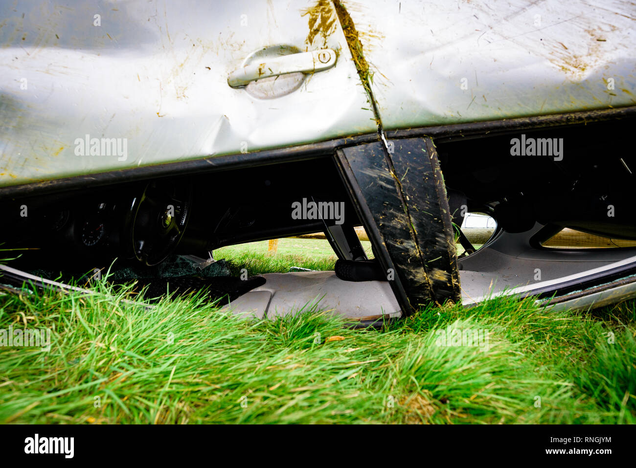 Car Crash and Car Damage. Vehicle rolled over in a field after a high ...