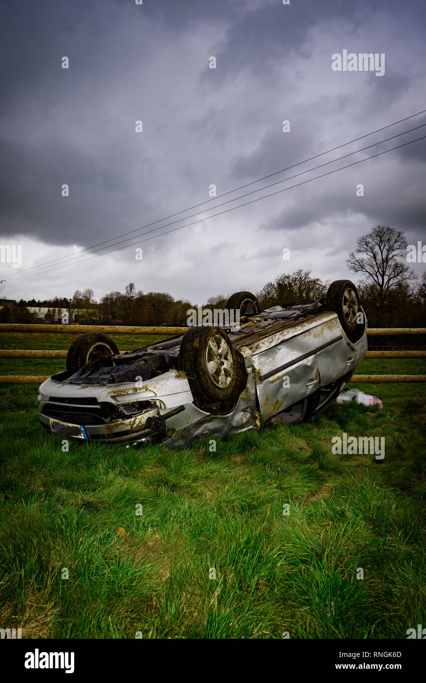 Car Crash and Car Damage. Vehicle rolled over in a field after a high ...