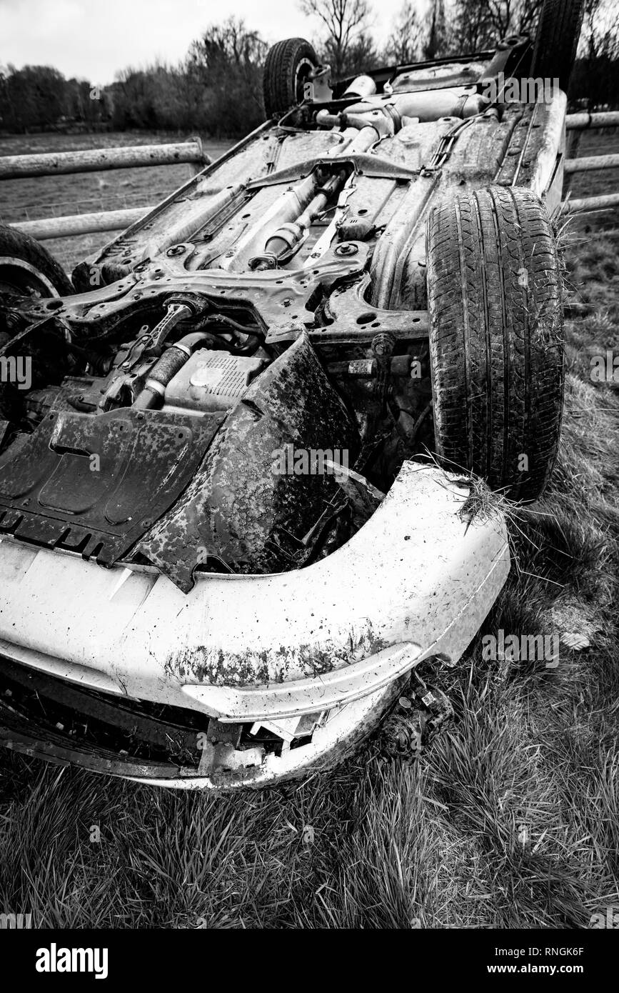 Car Crash and Car Damage. Vehicle rolled over in a field after a high ...