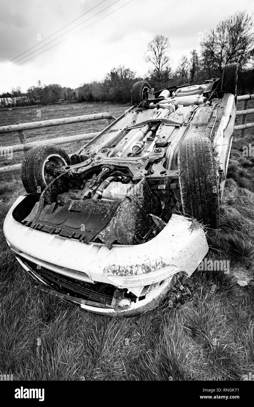 Car Crash and Car Damage. Vehicle rolled over in a field after a high ...