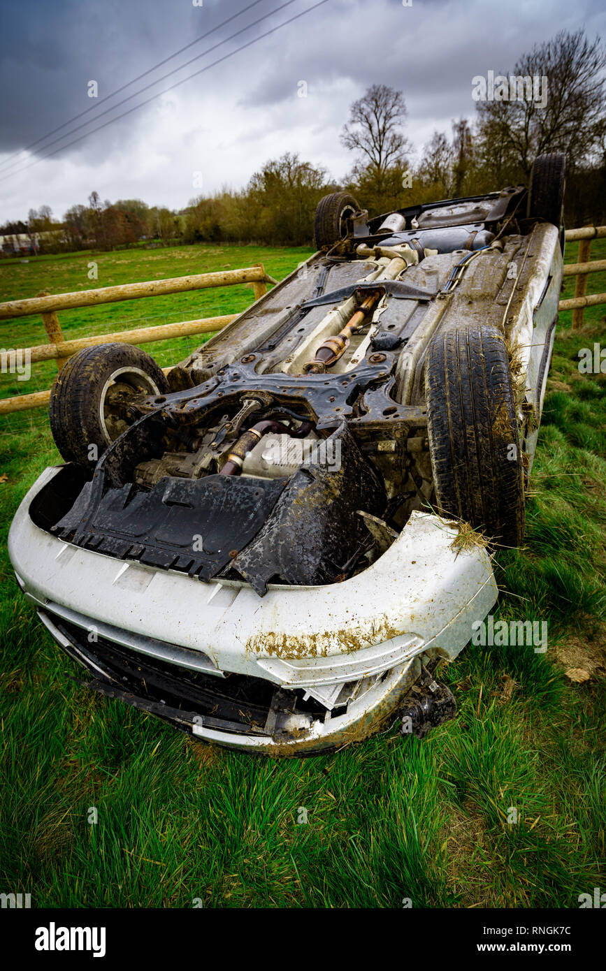 Car Crash and Car Damage. Vehicle rolled over in a field after a high ...