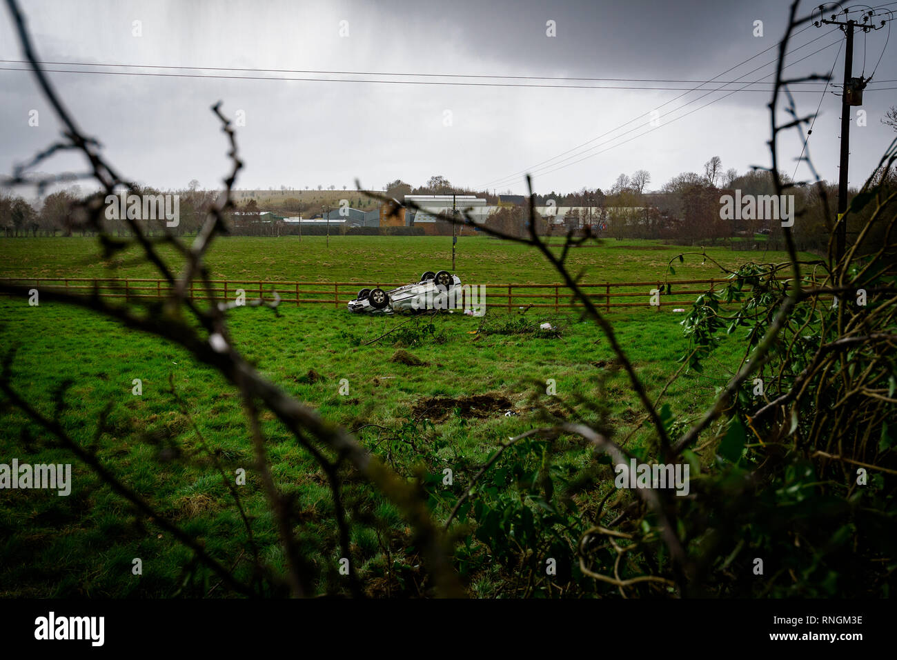 Car Crash and Car Damage; Vehicle upside down in a field after high ...