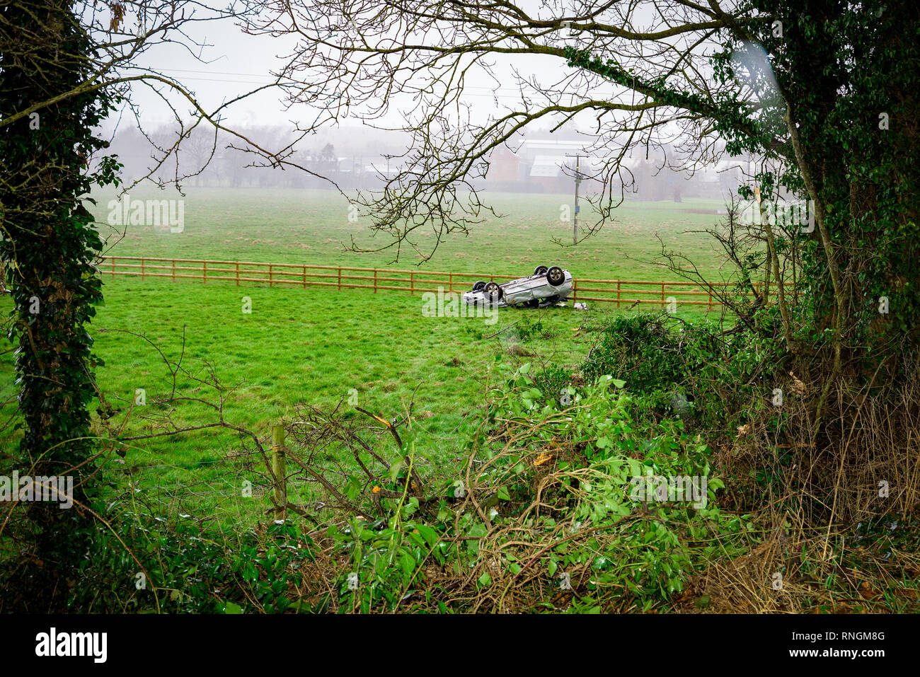 Car Crash and Car Damage; Vehicle upside down in a field after high ...