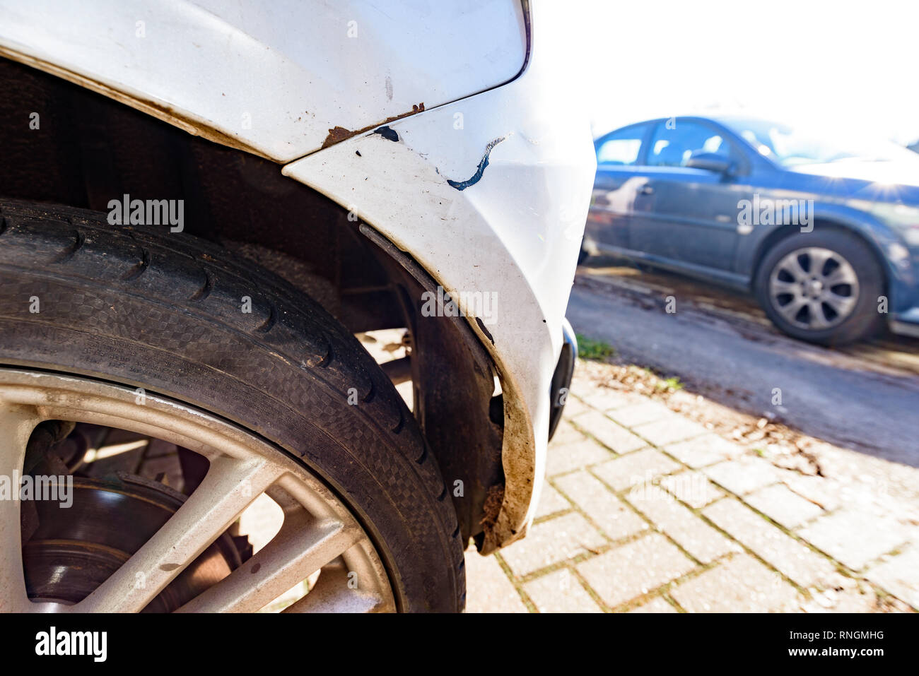 Car Crash and Car Damage; White vehicle rear bumper damage Stock Photo ...