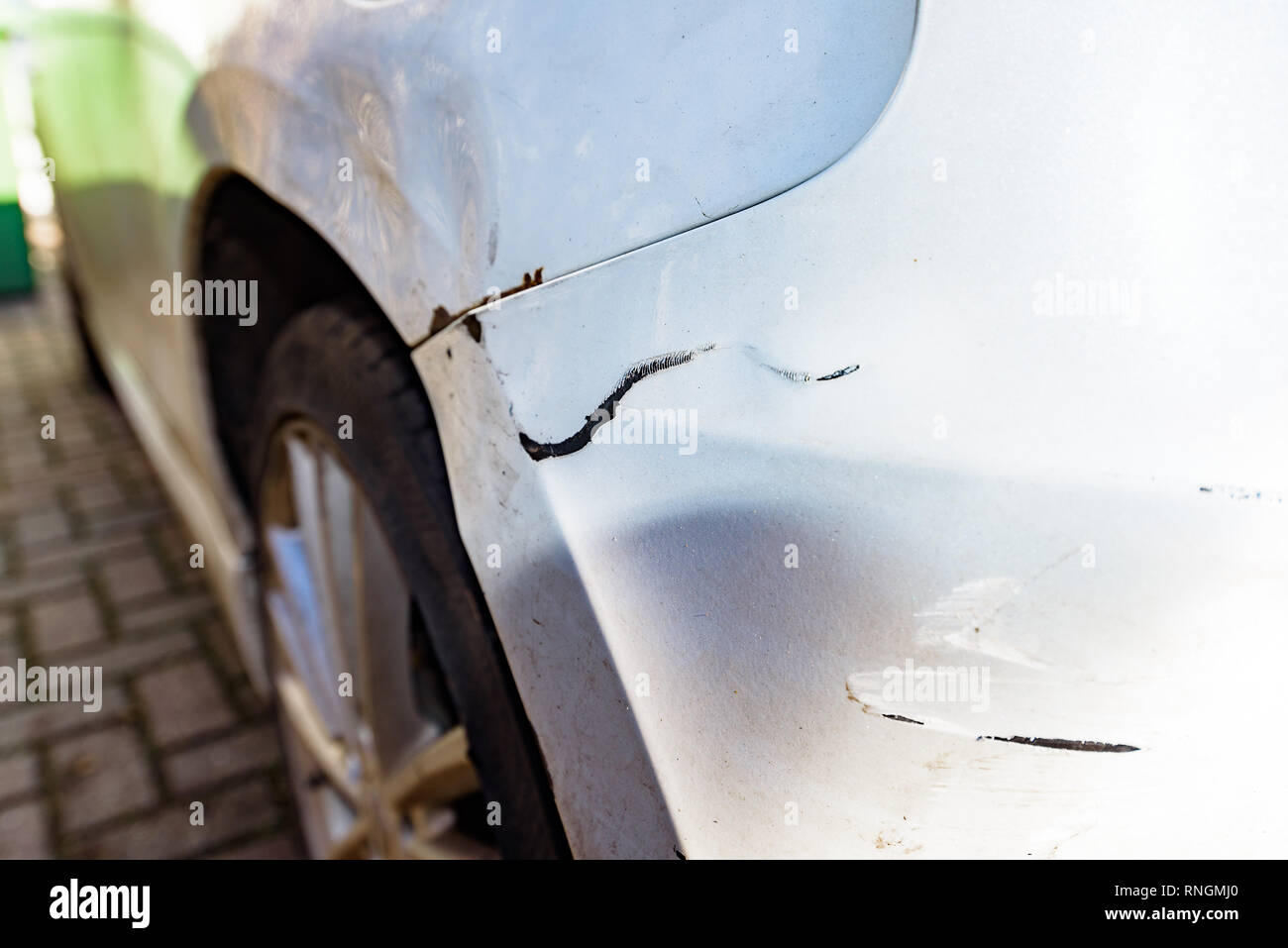 Car Crash and Car Damage; White vehicle rear bumper damage Stock Photo ...