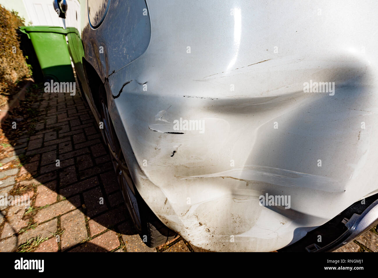 Car Crash and Car Damage; White vehicle rear bumper damage Stock Photo ...