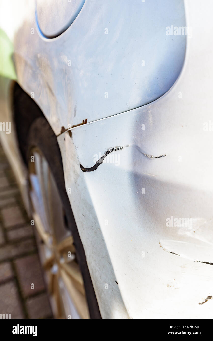 Car Crash and Car Damage; White vehicle rear bumper damage Stock Photo ...