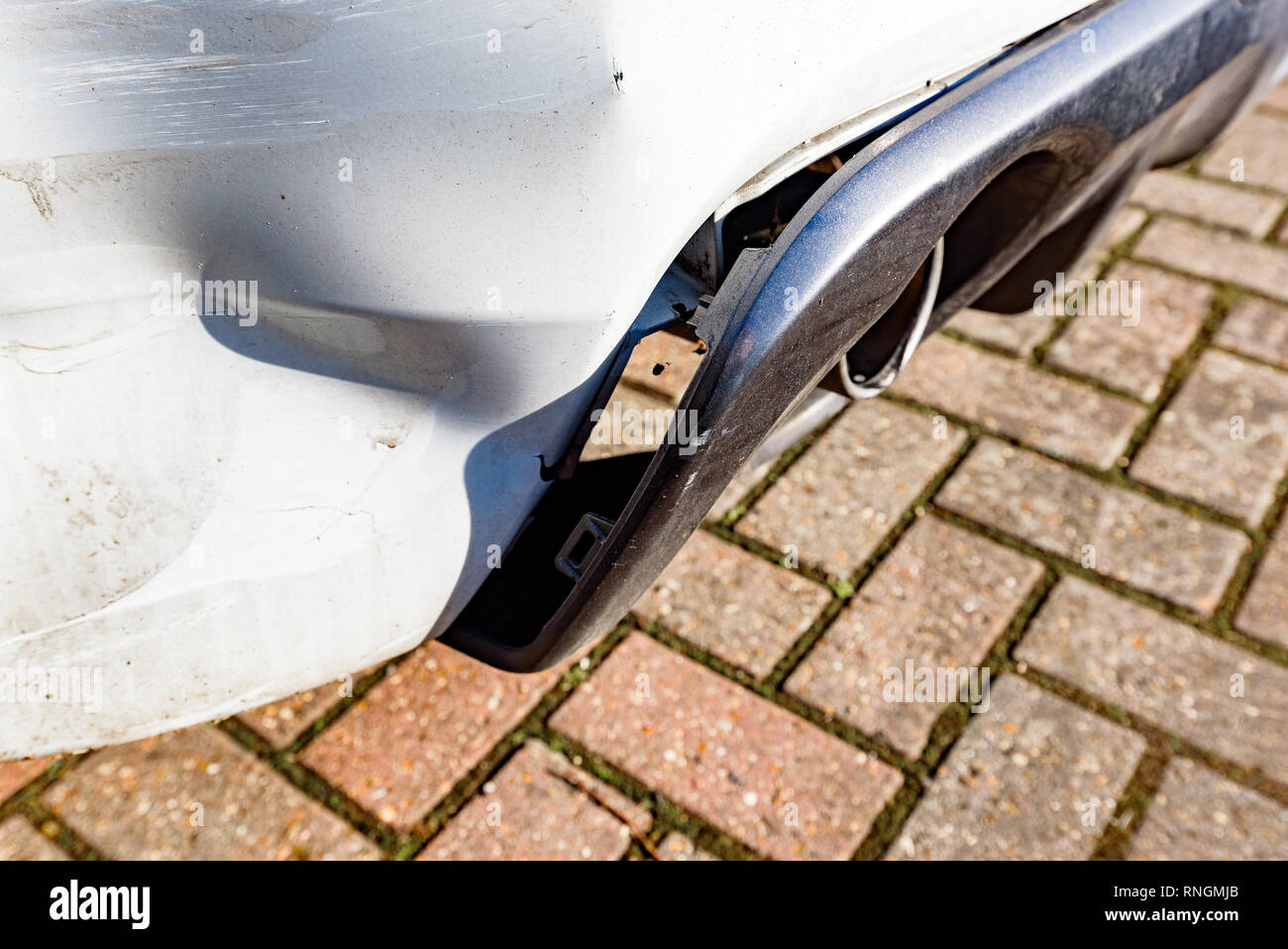 Car Crash and Car Damage; White vehicle rear bumper damage Stock Photo ...