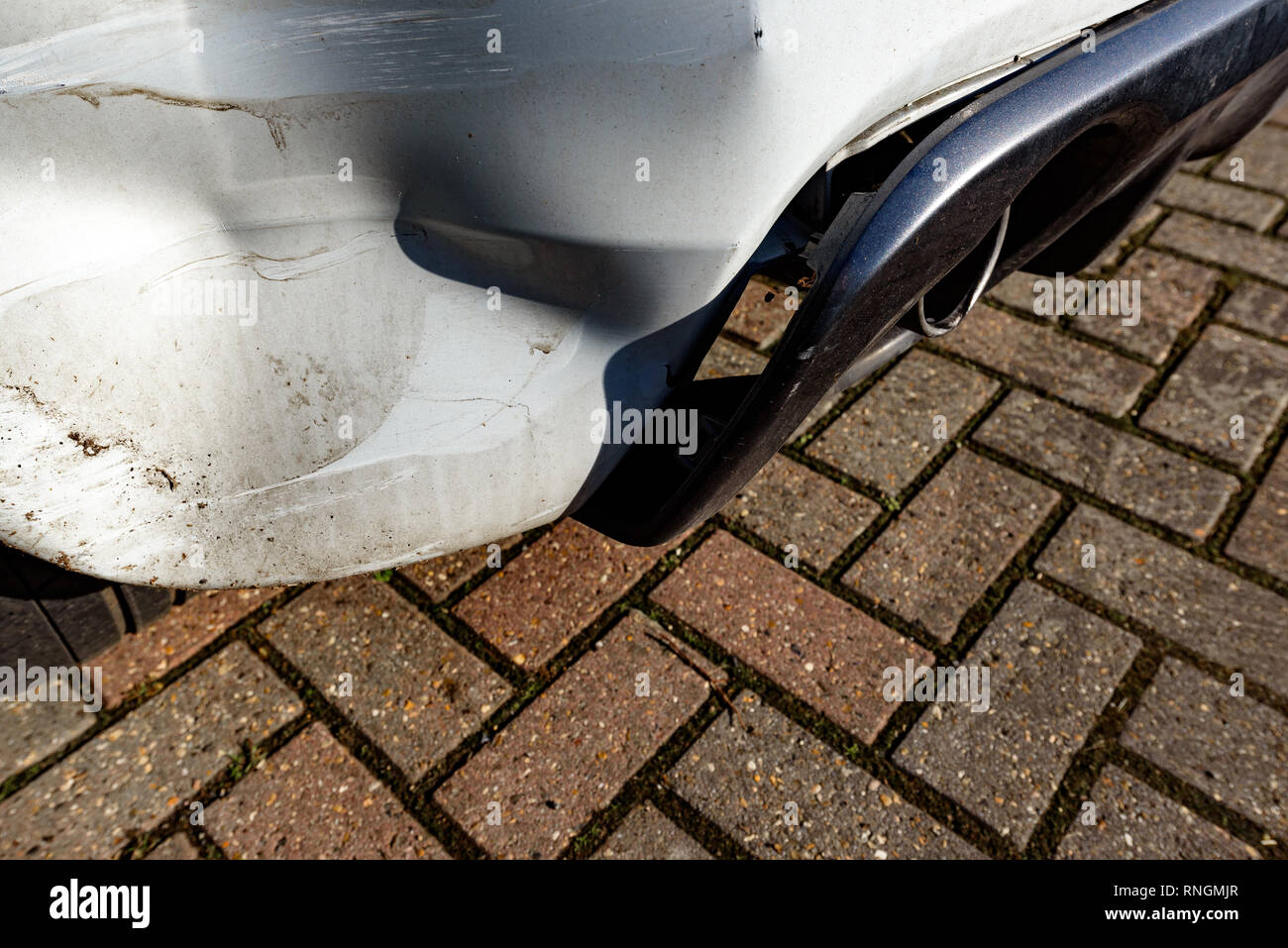 Car Crash and Car Damage; White vehicle rear bumper damage Stock Photo ...