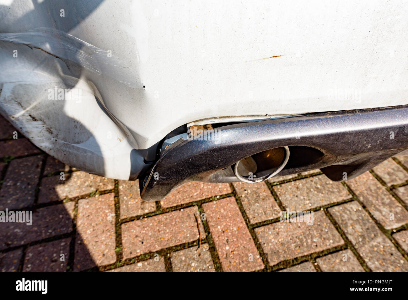 Car Crash and Car Damage; White vehicle rear bumper damage Stock Photo ...