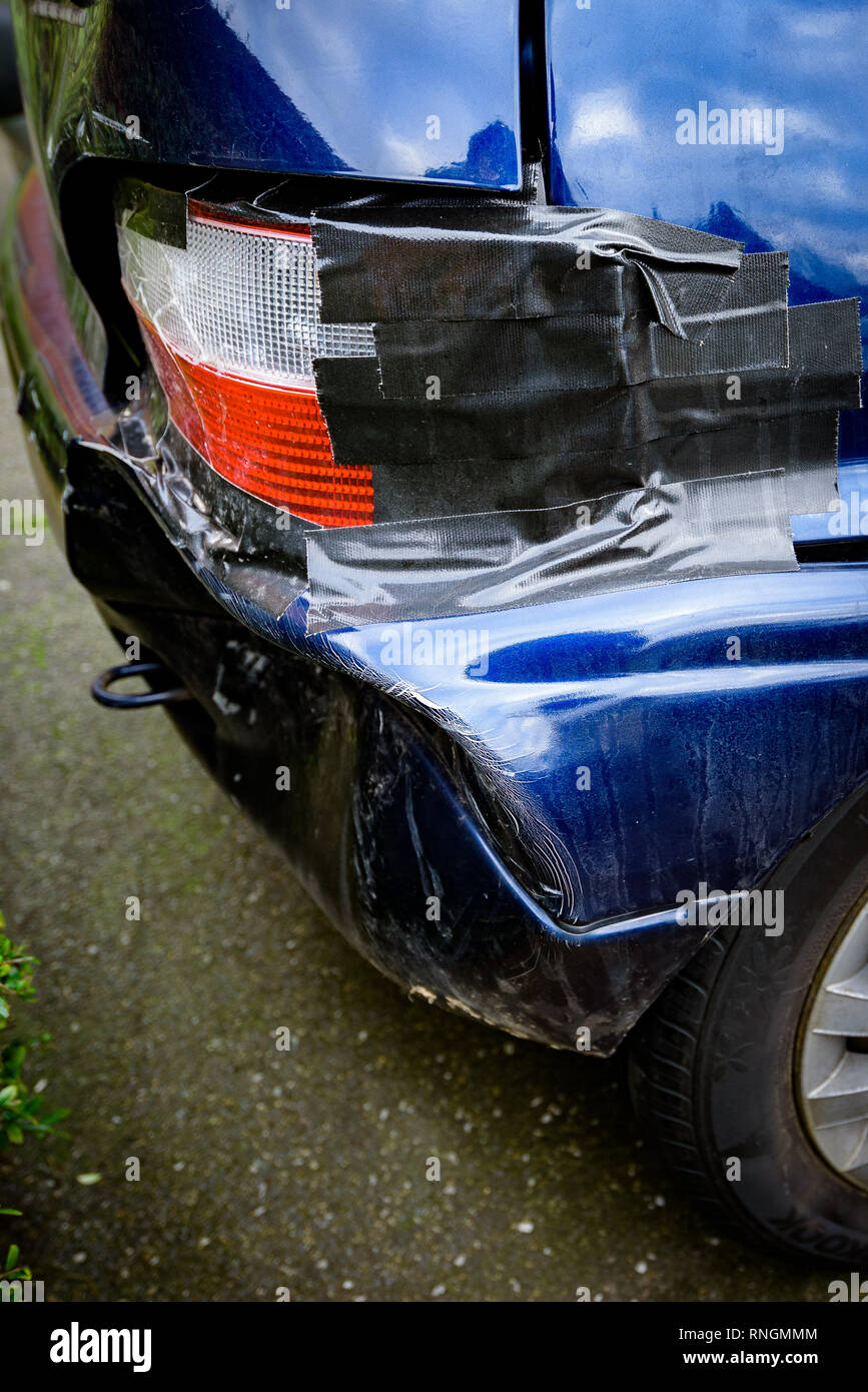 Car Crash and Car Damage; Rear end vehicle bumper and light damage ...