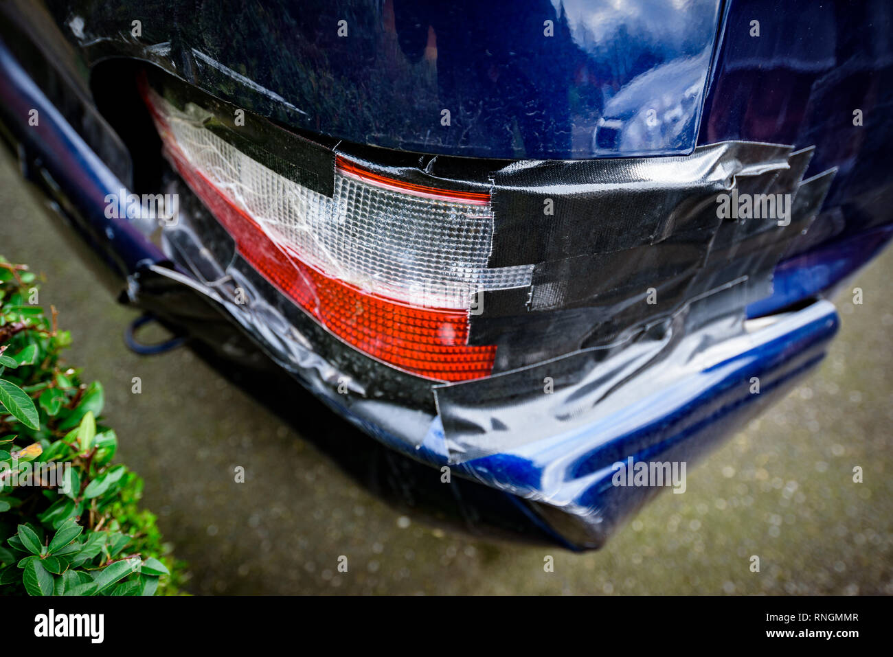 Car Crash and Car Damage; Rear end vehicle bumper and light damage ...