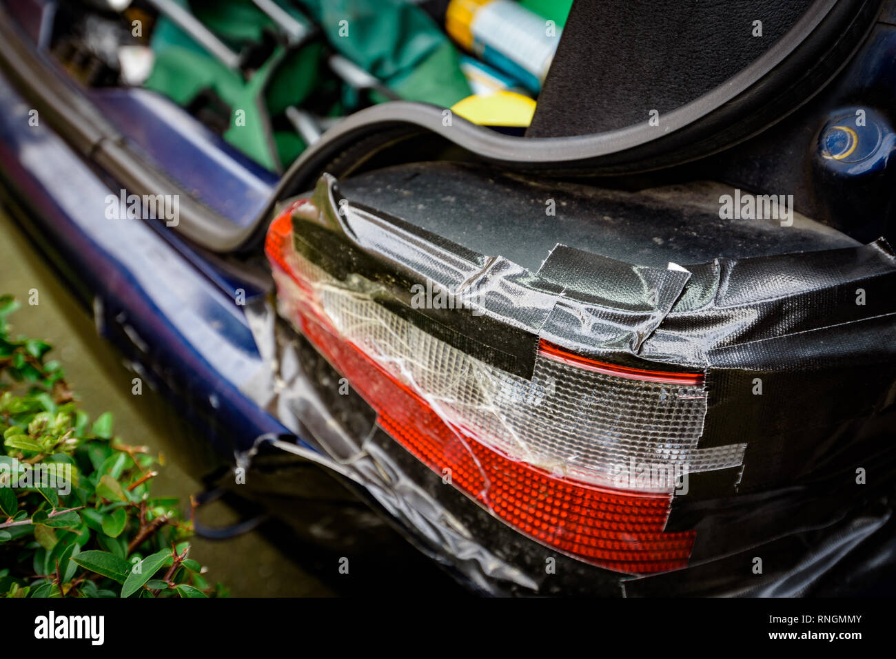 Car Crash and Car Damage; Rear end vehicle bumper and light damage ...