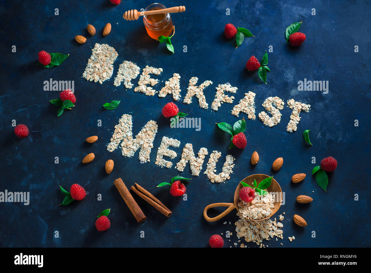 Breakfast Menu words written with oatmeal with raspberries and cinnamon ...