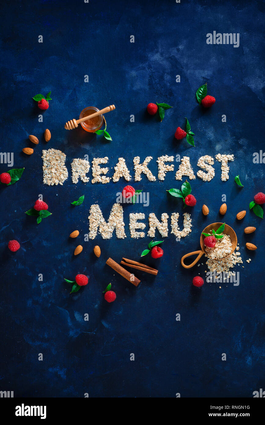 Breakfast Menu words written with oatmeal with raspberries and cinnamon ...