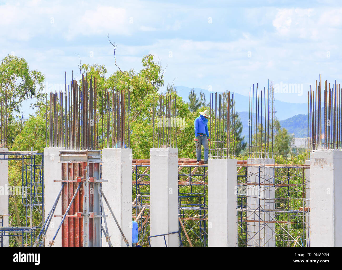 construction laborer team working on high ground building housing in ...