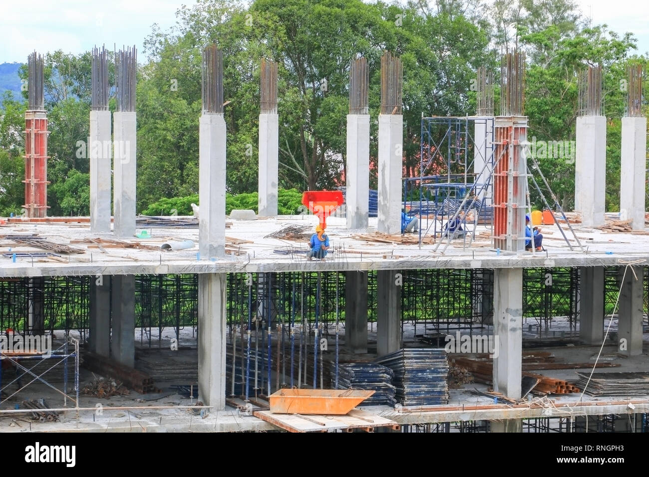 construction laborer team working on high ground building housing in ...