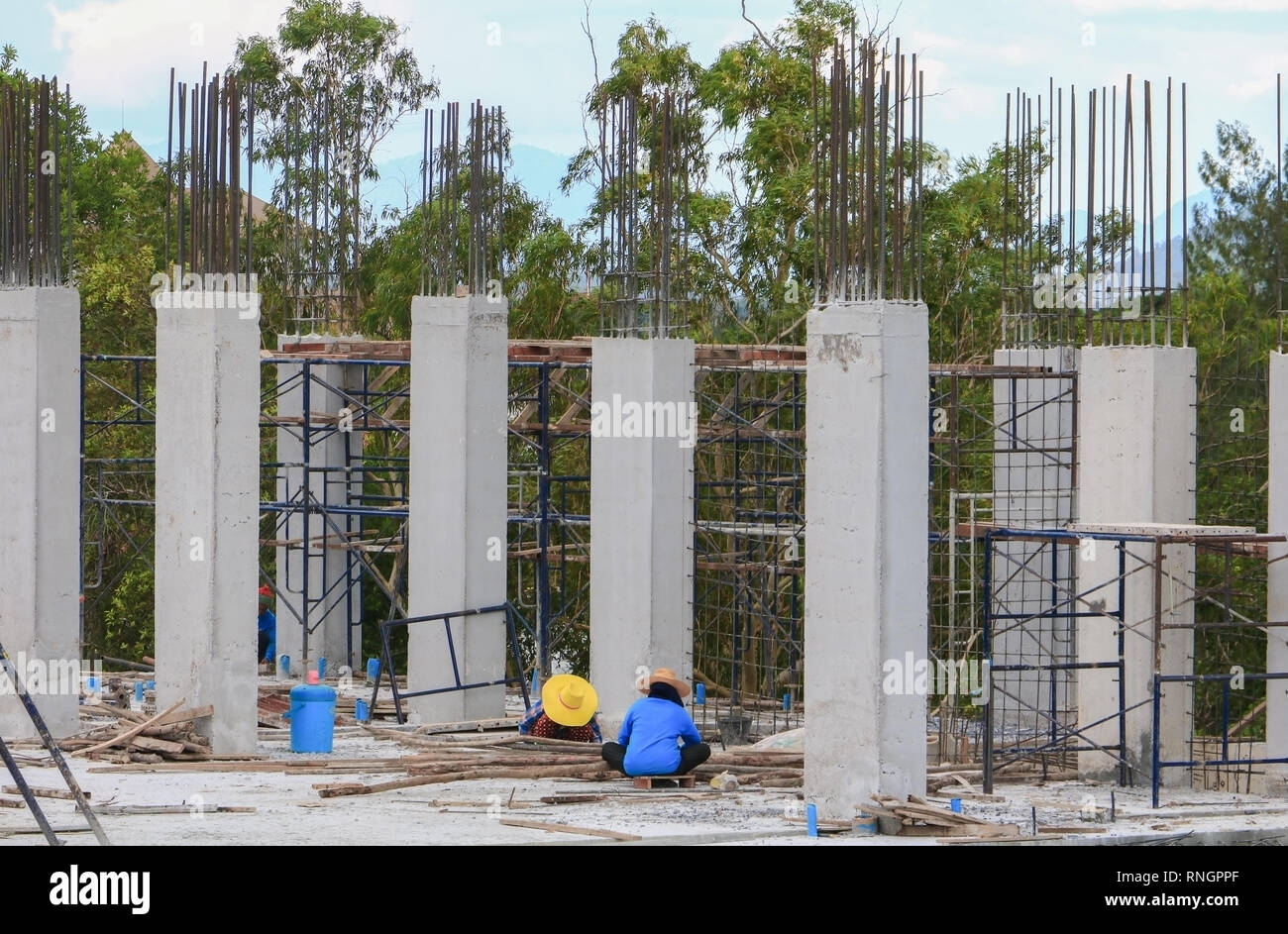 construction laborer team working on high ground building housing in ...