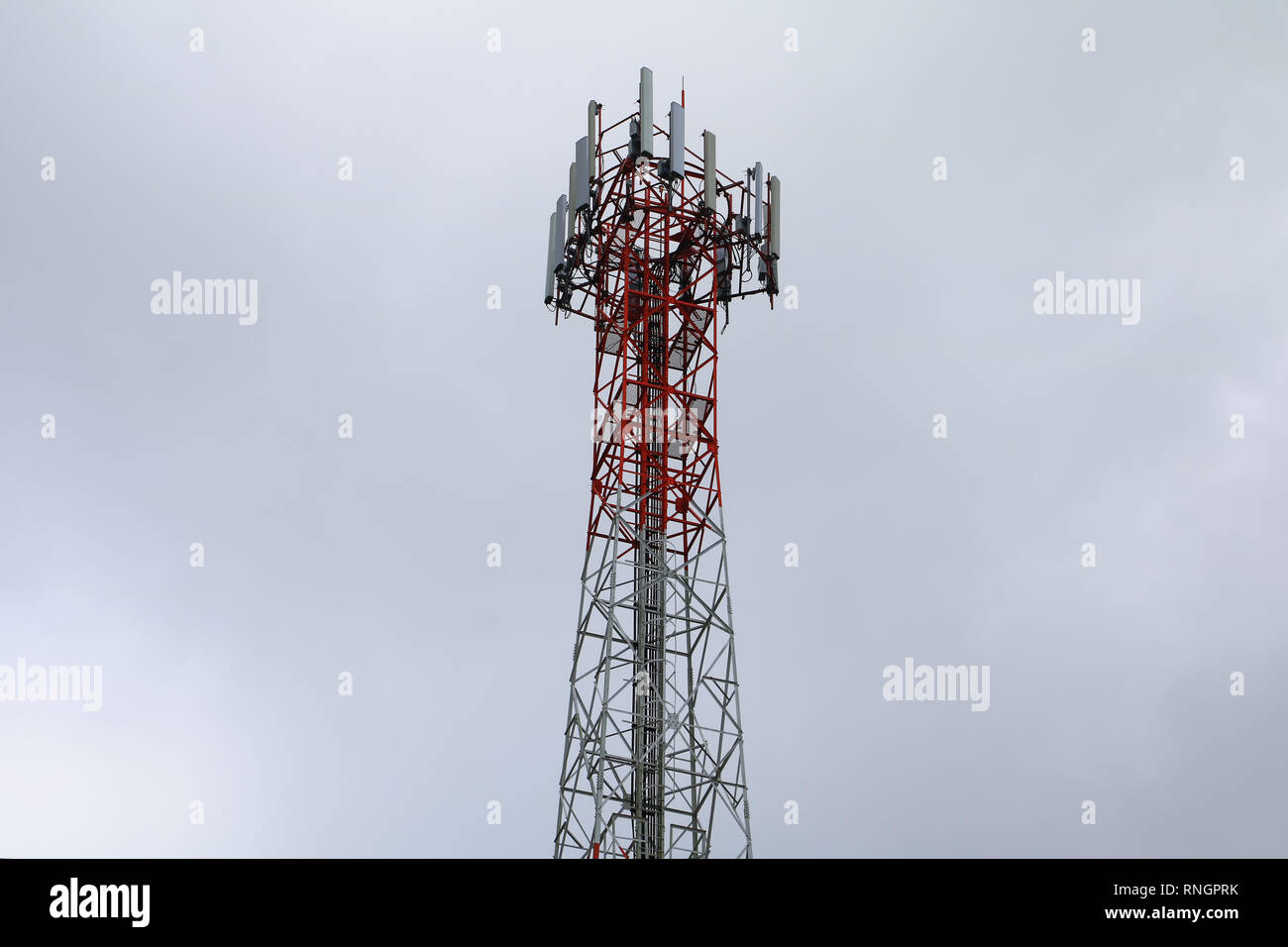 Telecommunication tower red and white antenna radio telephone mobile on ...
