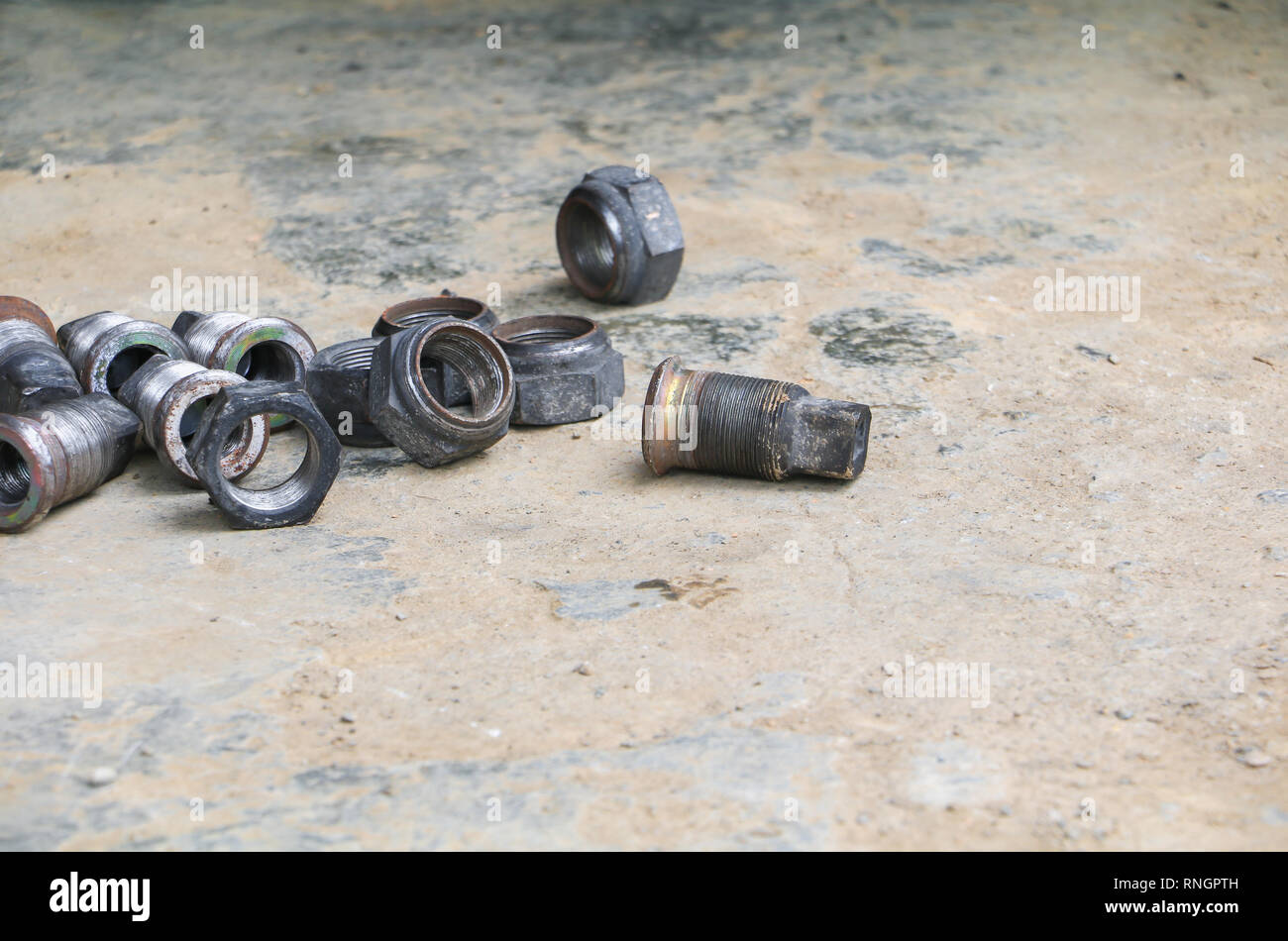 nut on the cement in the garage Stock Photo - Alamy