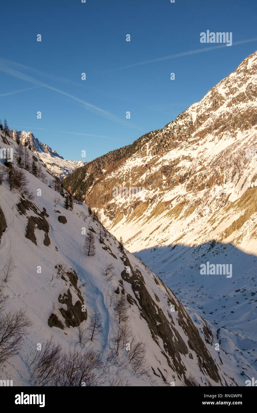 The snow-filled valley at Montenvers below the Mer de Glace glacier ...