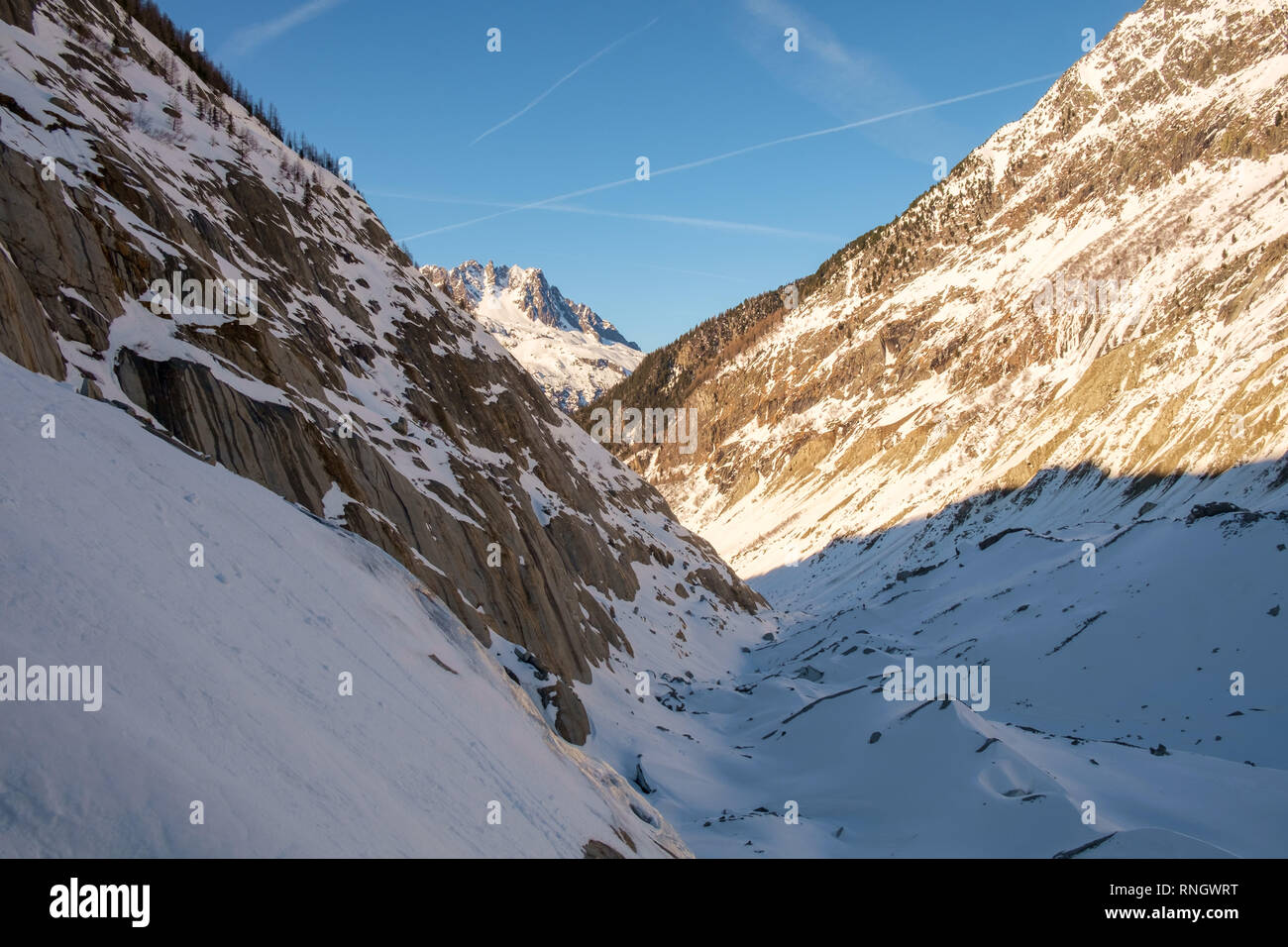 The snow-filled valley at Montenvers below the Mer de Glace glacier ...