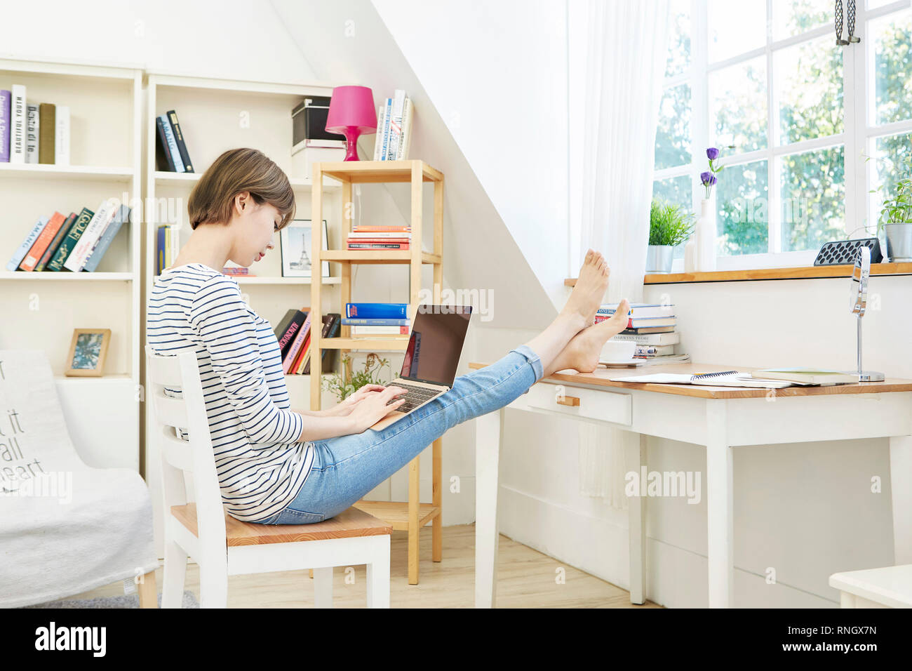 Woman One Leg On Desk High Resolution Stock Photography and Images - Alamy