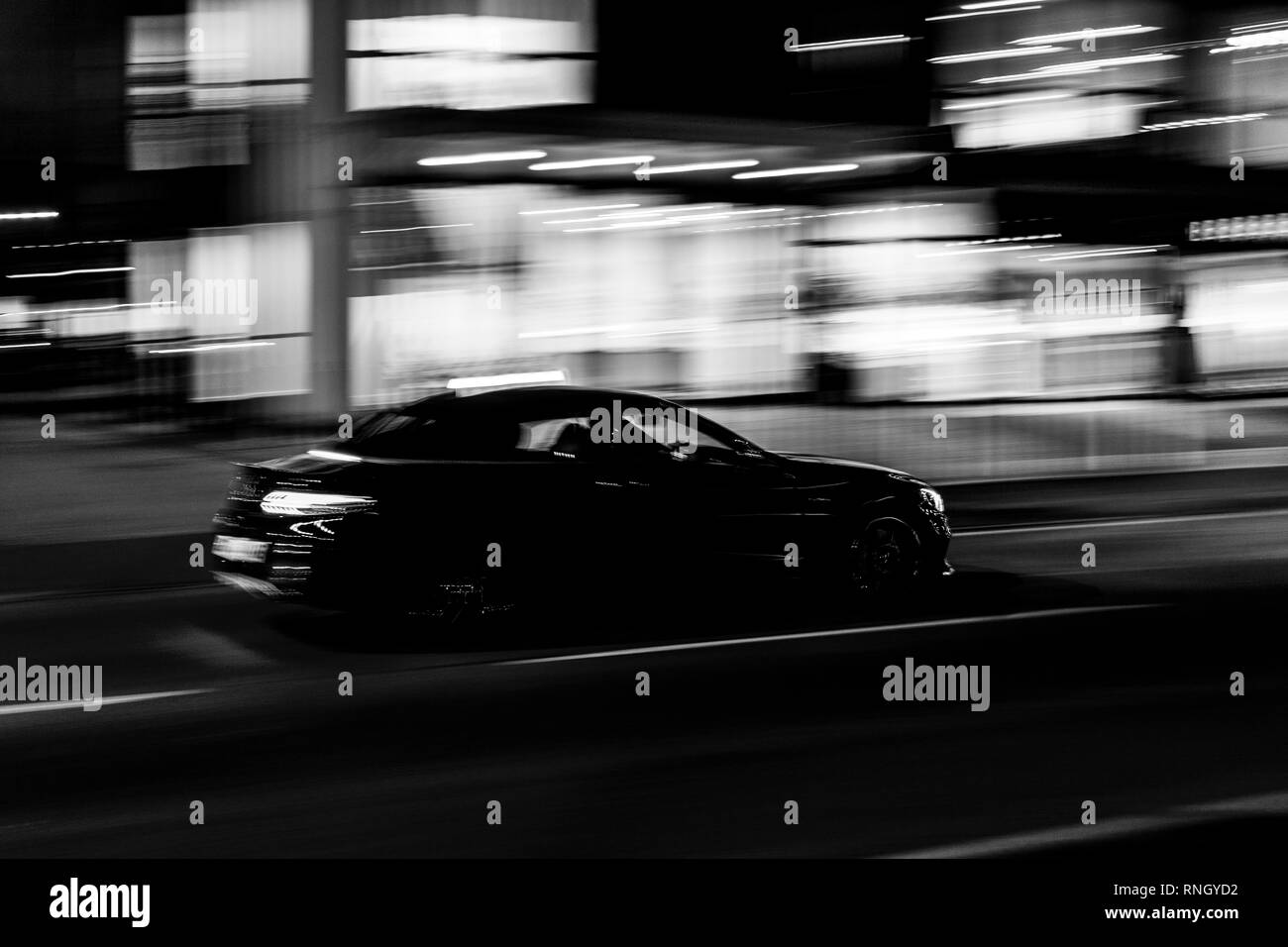 Mercedes Benz in Motion at night Stock Photo - Alamy
