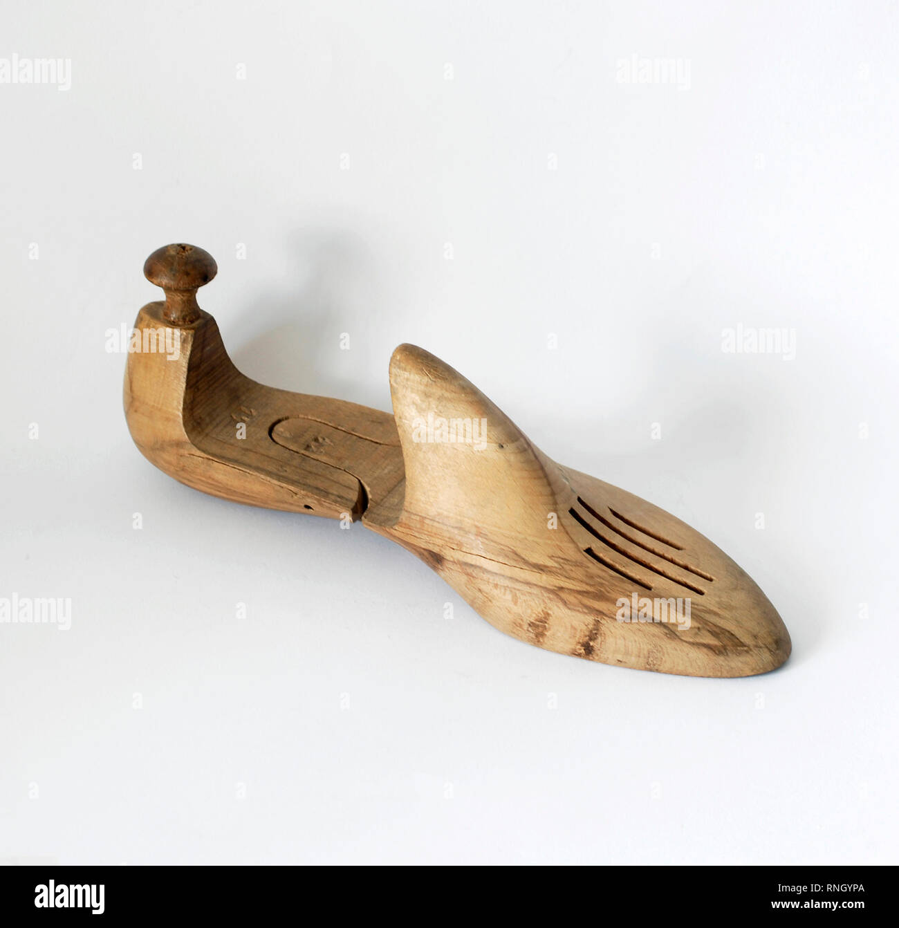 Vintage folding wooden shoe last Stock Photo - Alamy