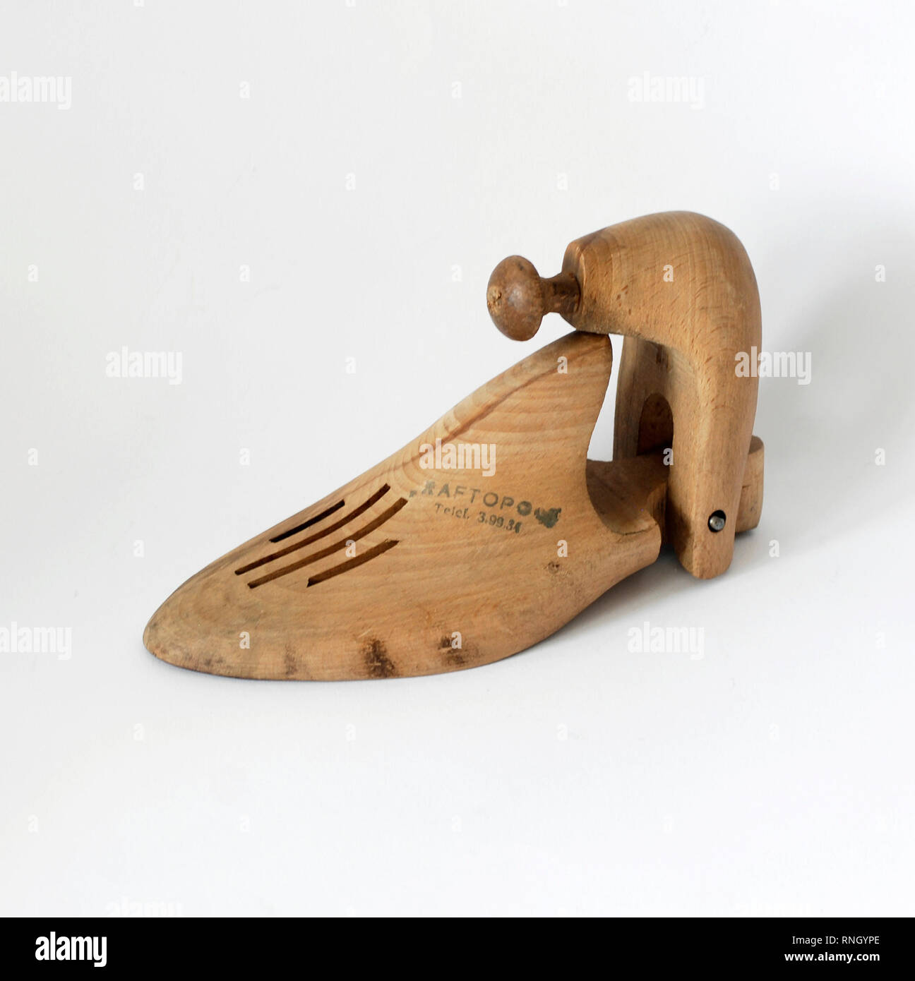 Vintage folding wooden shoe last Stock Photo - Alamy