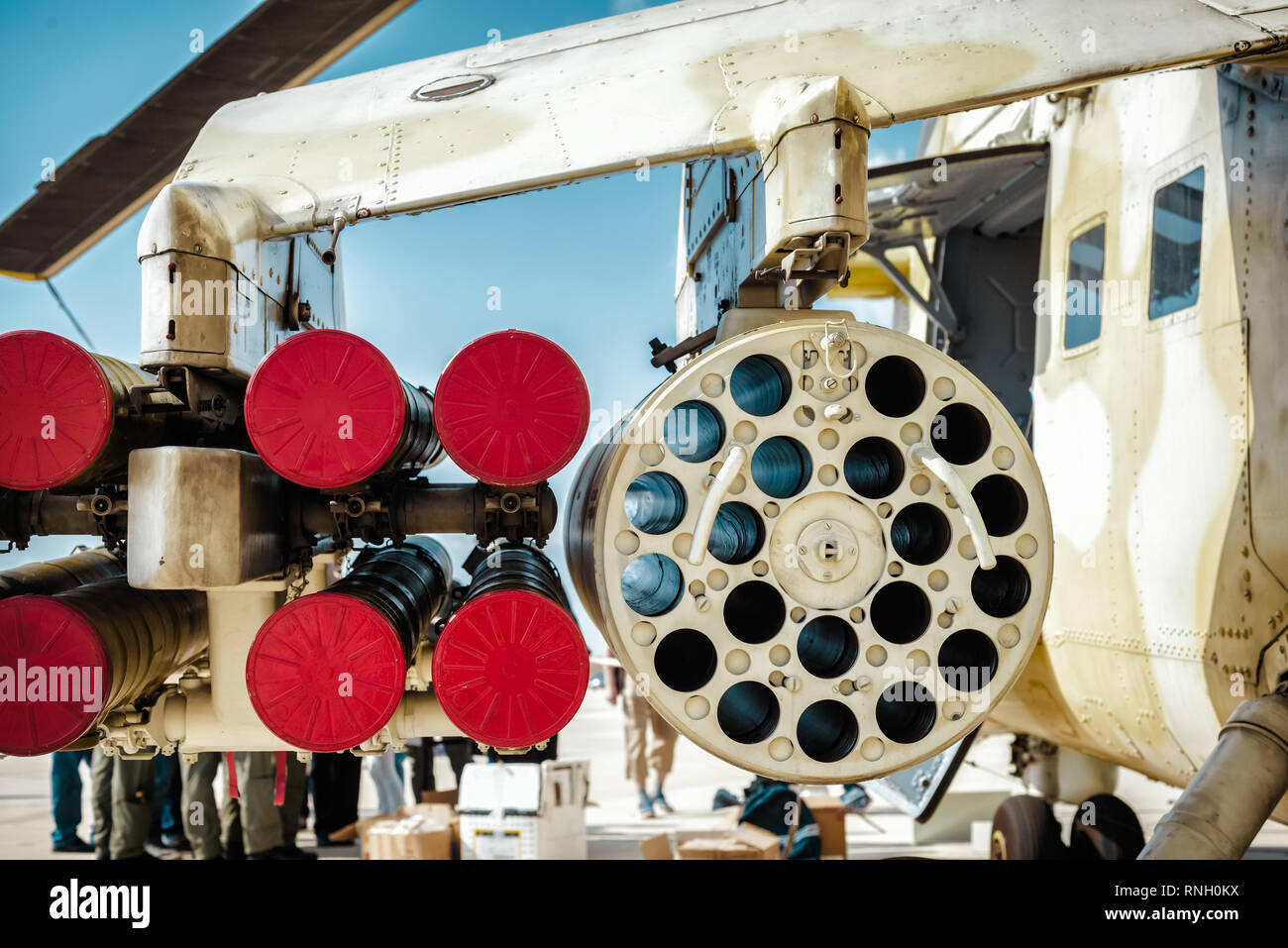 Missile launcher under wing of military helicopter Stock Photo - Alamy