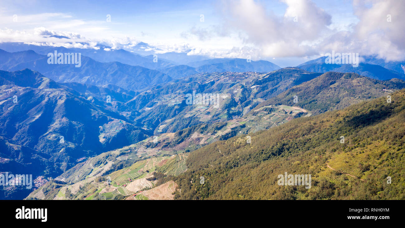 Aerial flying towards spectacular mountain hi-res stock photography and ...