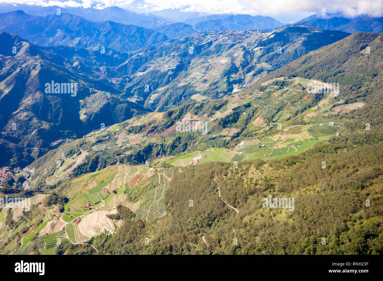 Aerial flying towards spectacular mountain hi-res stock photography and ...