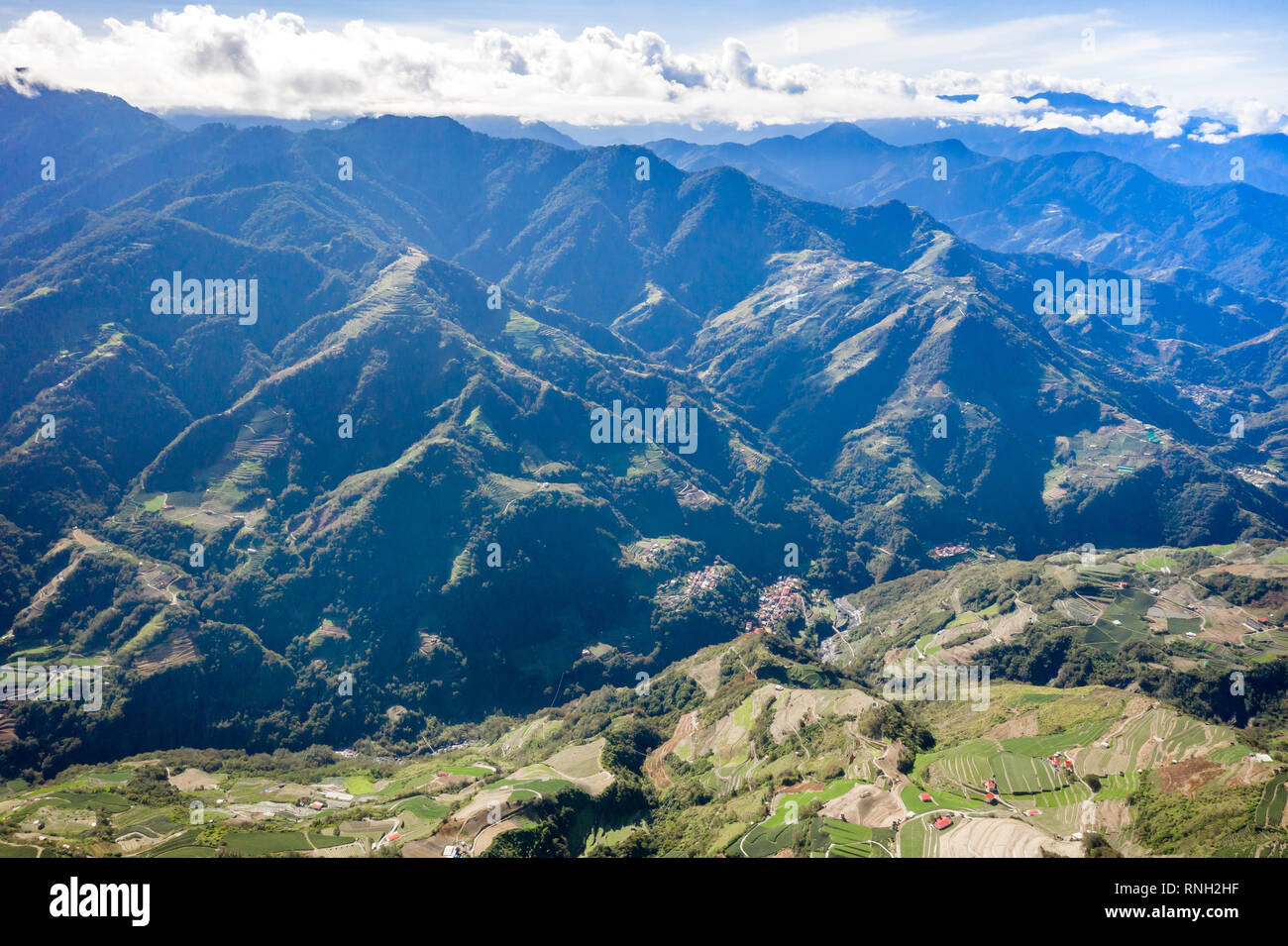Aerial flying towards spectacular mountain hi-res stock photography and ...