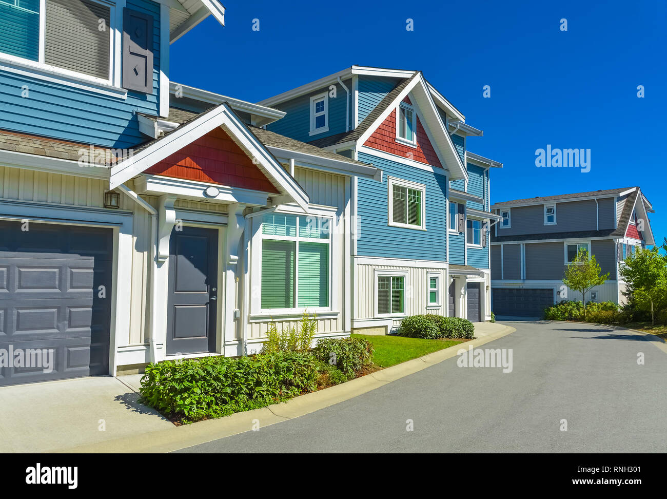 Row of front doors housing estate hi-res stock photography and images ...