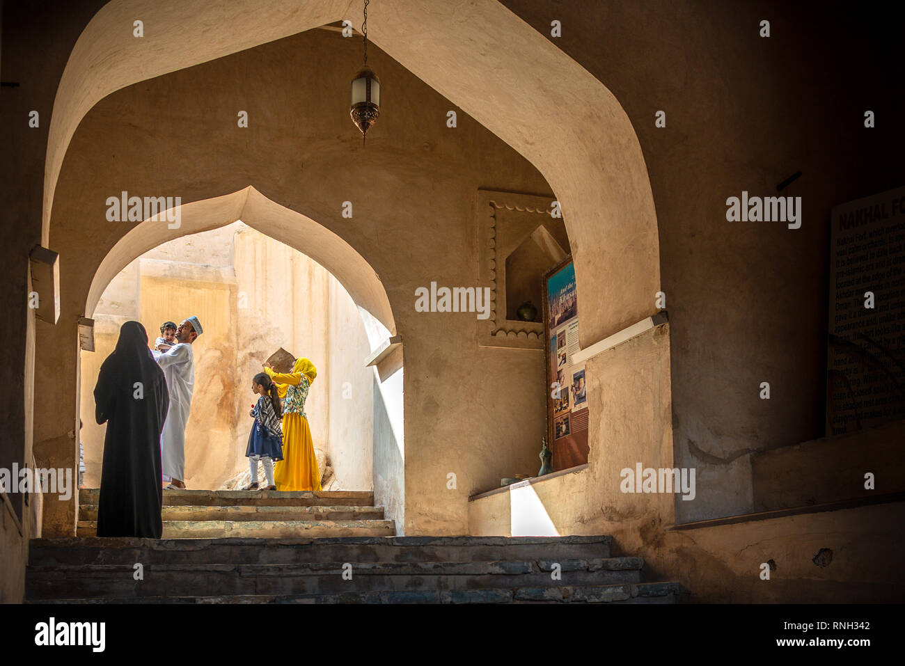 Omani family visiting Rustaq Fort, Sultanate of Oman Stock Photo - Alamy