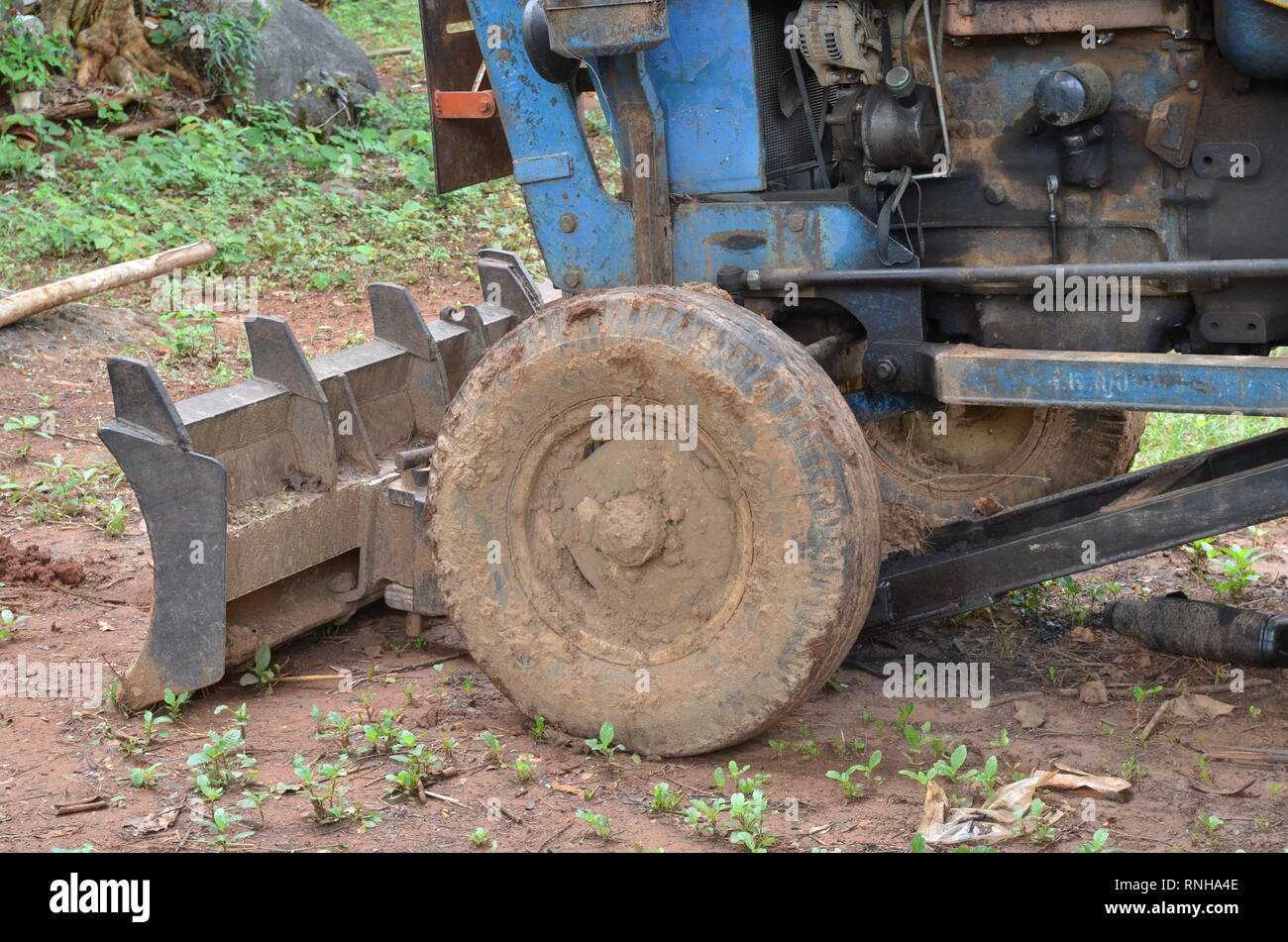 Tractor in a field, agricultural scene Stock Photo - Alamy