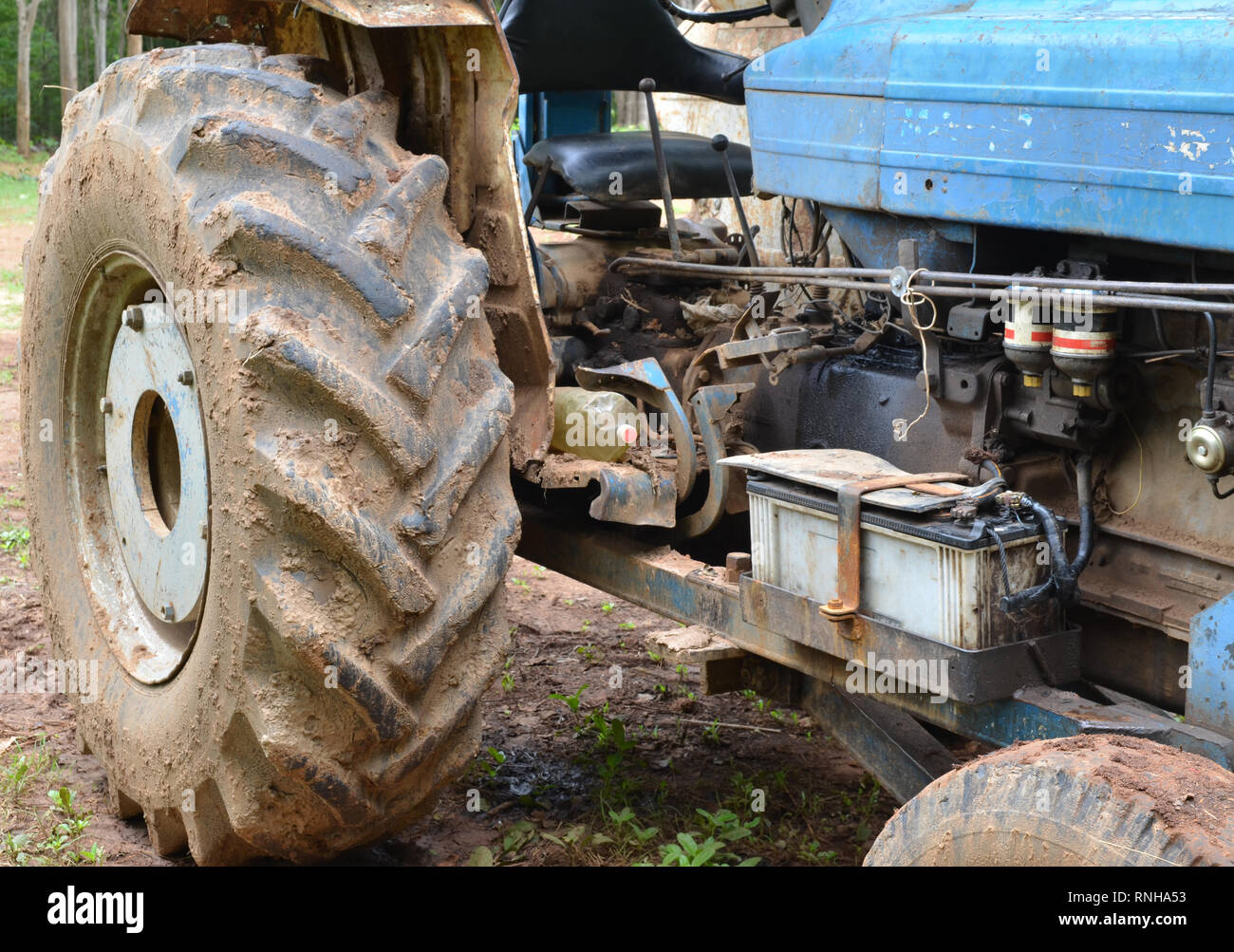 Tractor in a field, agricultural scene Stock Photo - Alamy