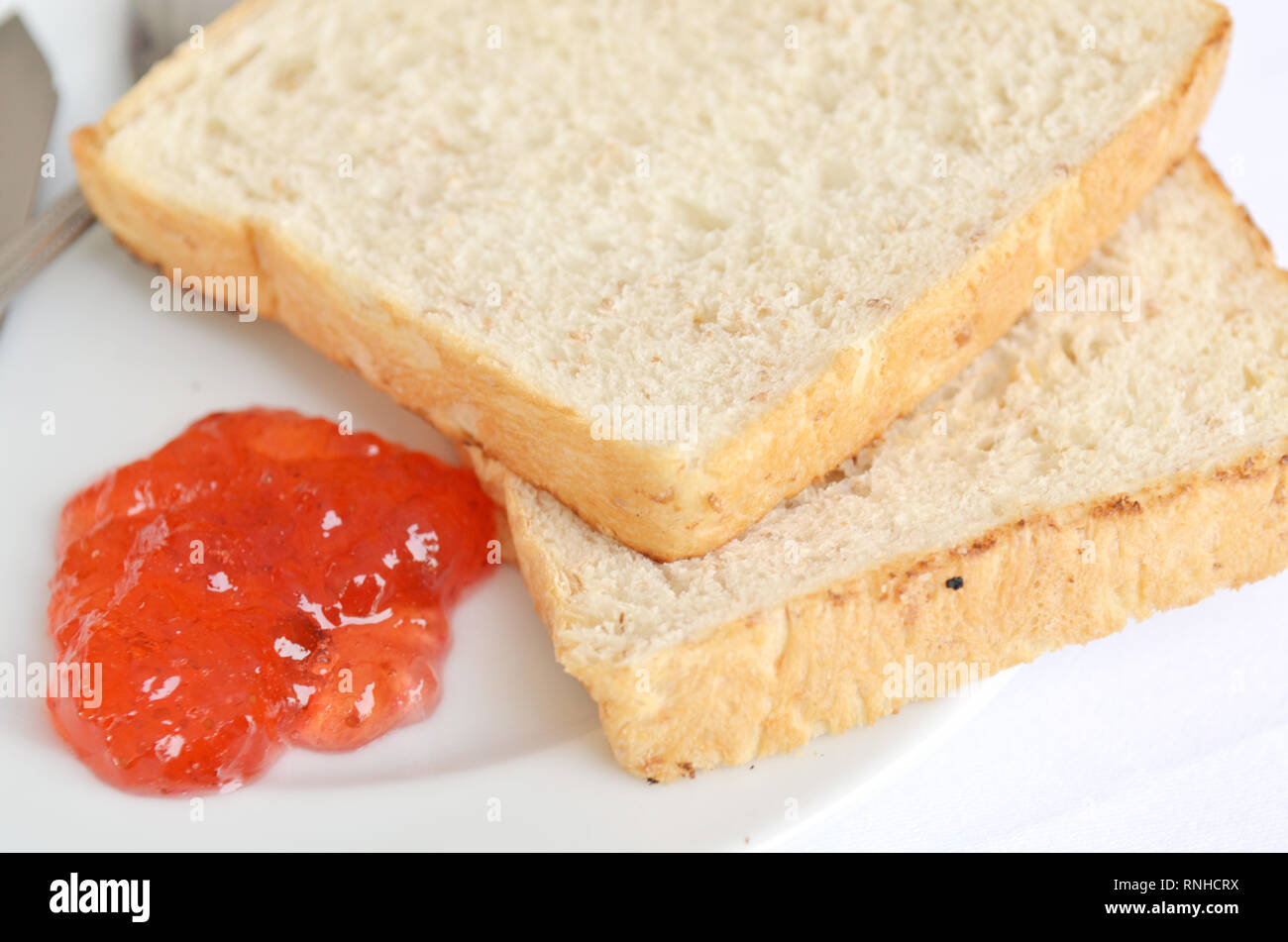A good piece of toast with jam, Strawberry Butter Gallery Stock Photo ...