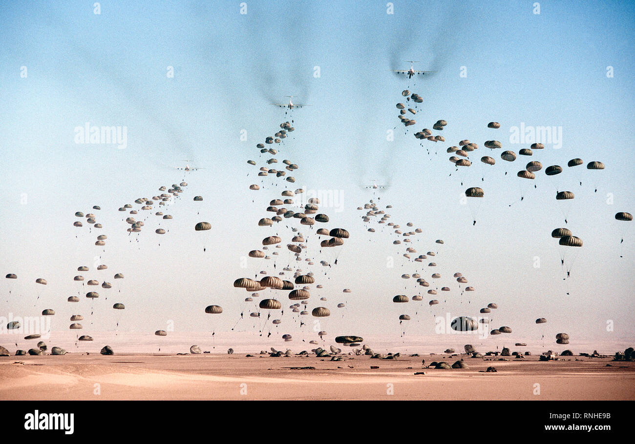 A U.S. and Egyptian troops take part in a mass parachute jump during ...
