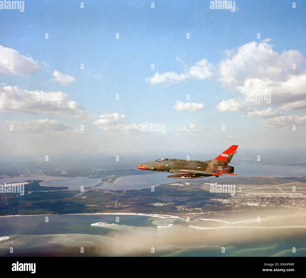 1981 - An air-to-air left side view of a QF-100D Super Sabre aircraft ...