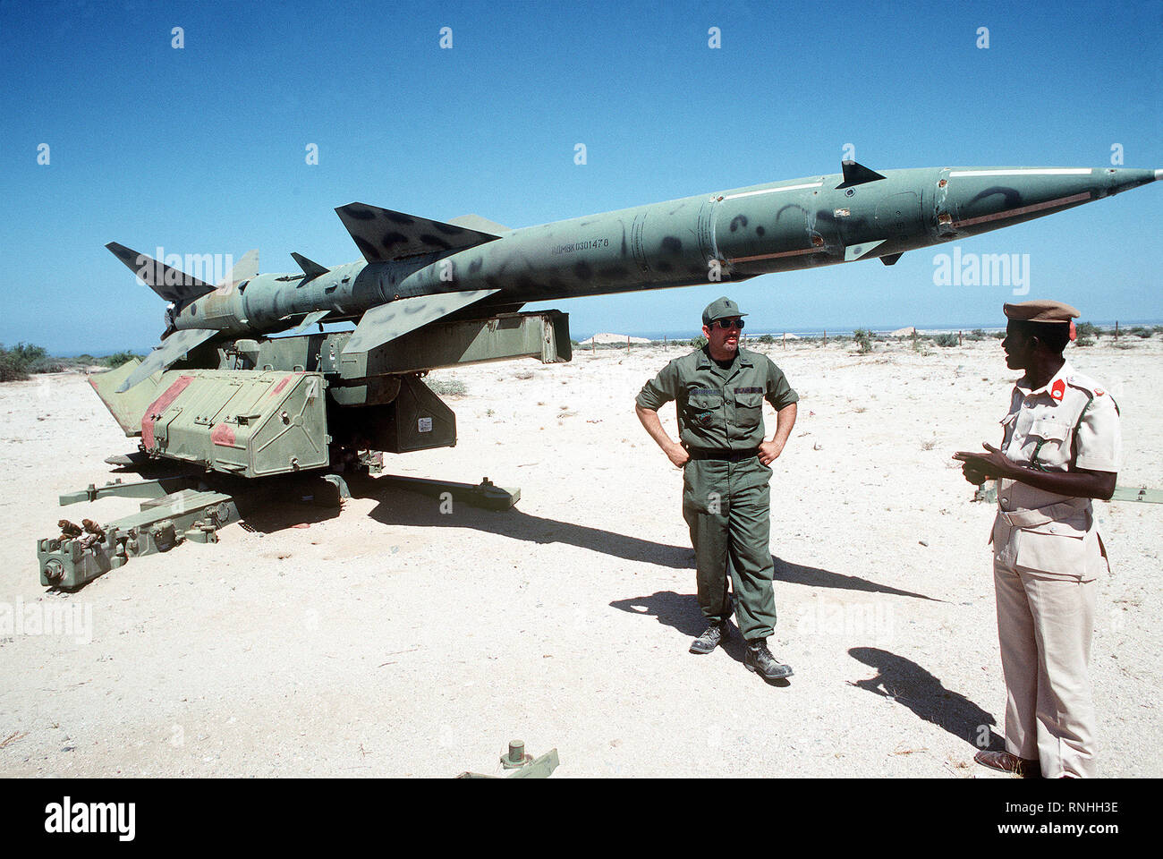 1981 - A U.S. and a Somalian soldier discuss the SAM-2 medium-range ...